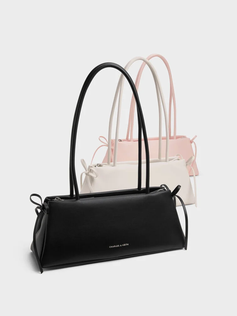 Bolsos East-West: Todo lo que Necesitas Saber - CHARLES & KEITH ES