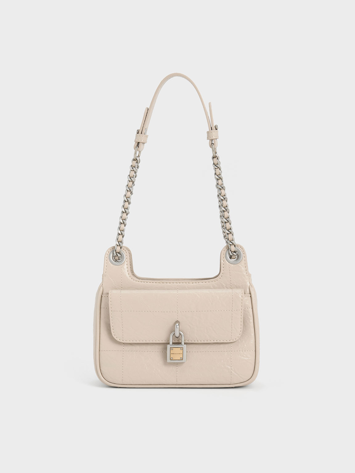 Bolso Suki acabado arrugado con candado - Avena - CHARLES & KEITH EU